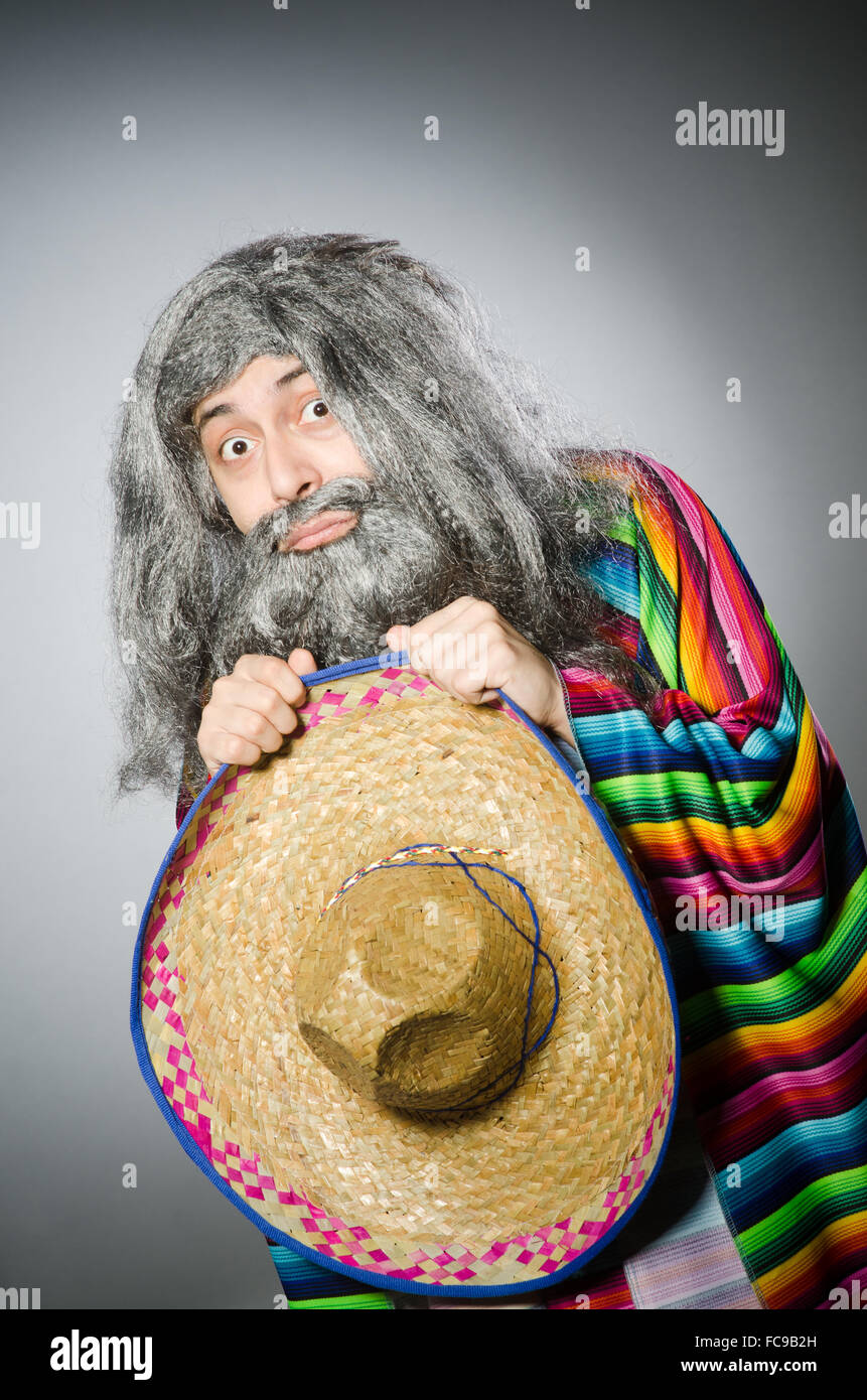 Person wearing sombrero hat in funny concept Stock Photo - Alamy