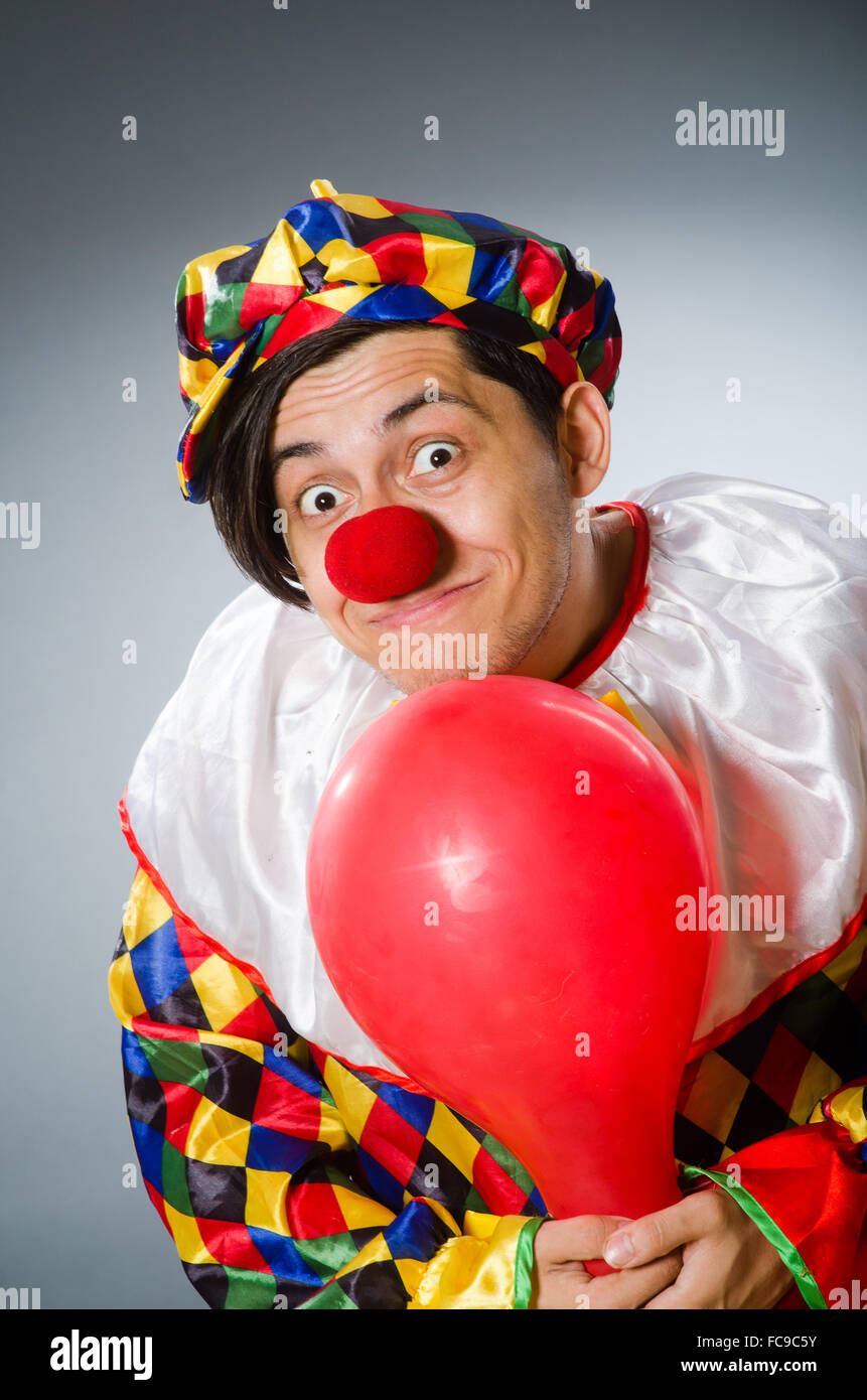 Funny clown in comical concept Stock Photo - Alamy