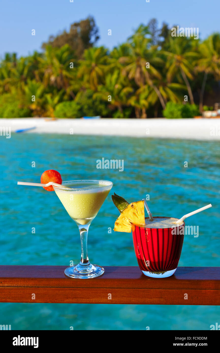 Fruit cocktail on Maldives beach Stock Photo - Alamy