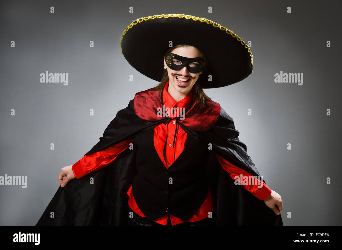 Person wearing sombrero hat in funny concept Stock Photo - Alamy