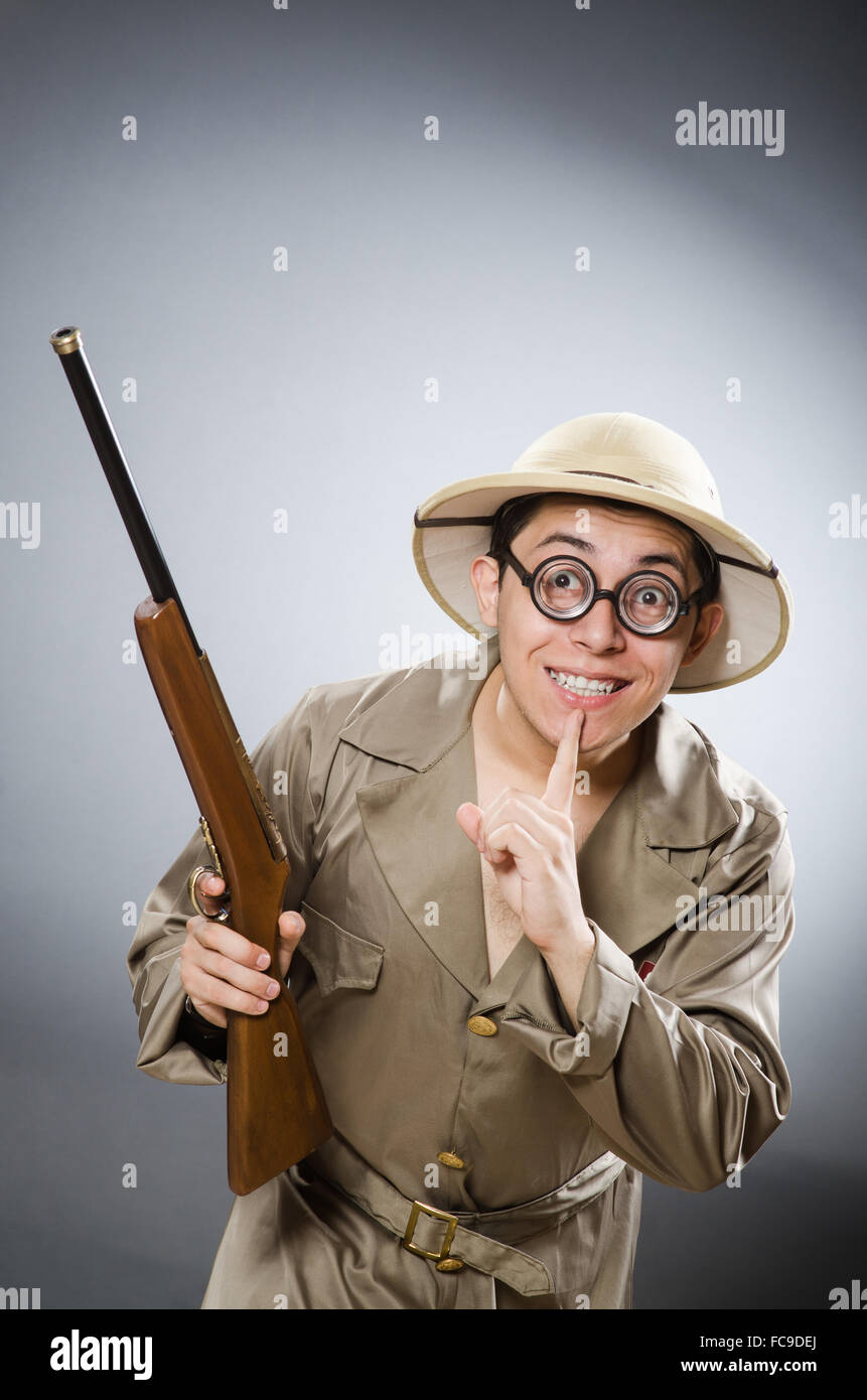 Funny hunter in hunting concept Stock Photo - Alamy