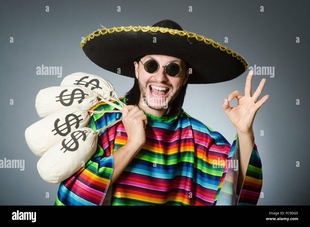Mexican man with money sacks Stock Photo - Alamy