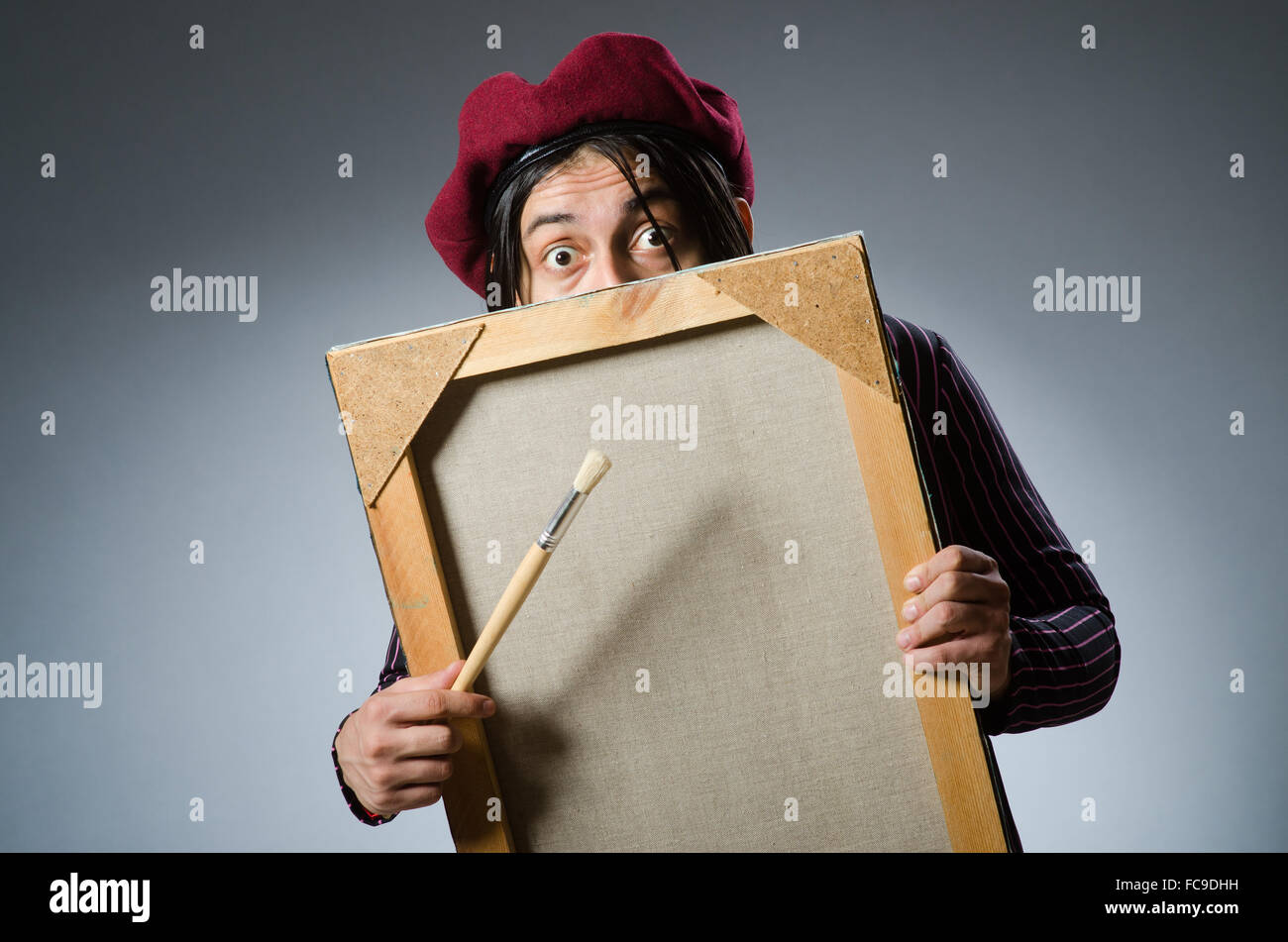 Funny artist with his artwork Stock Photo - Alamy