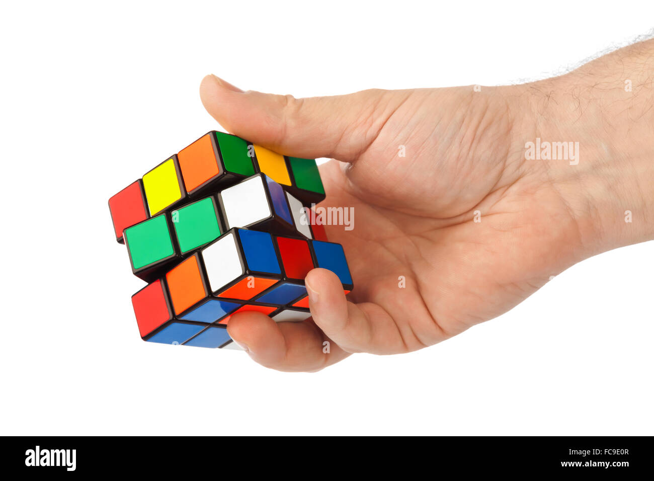 Cube puzzle in hand Stock Photo - Alamy
