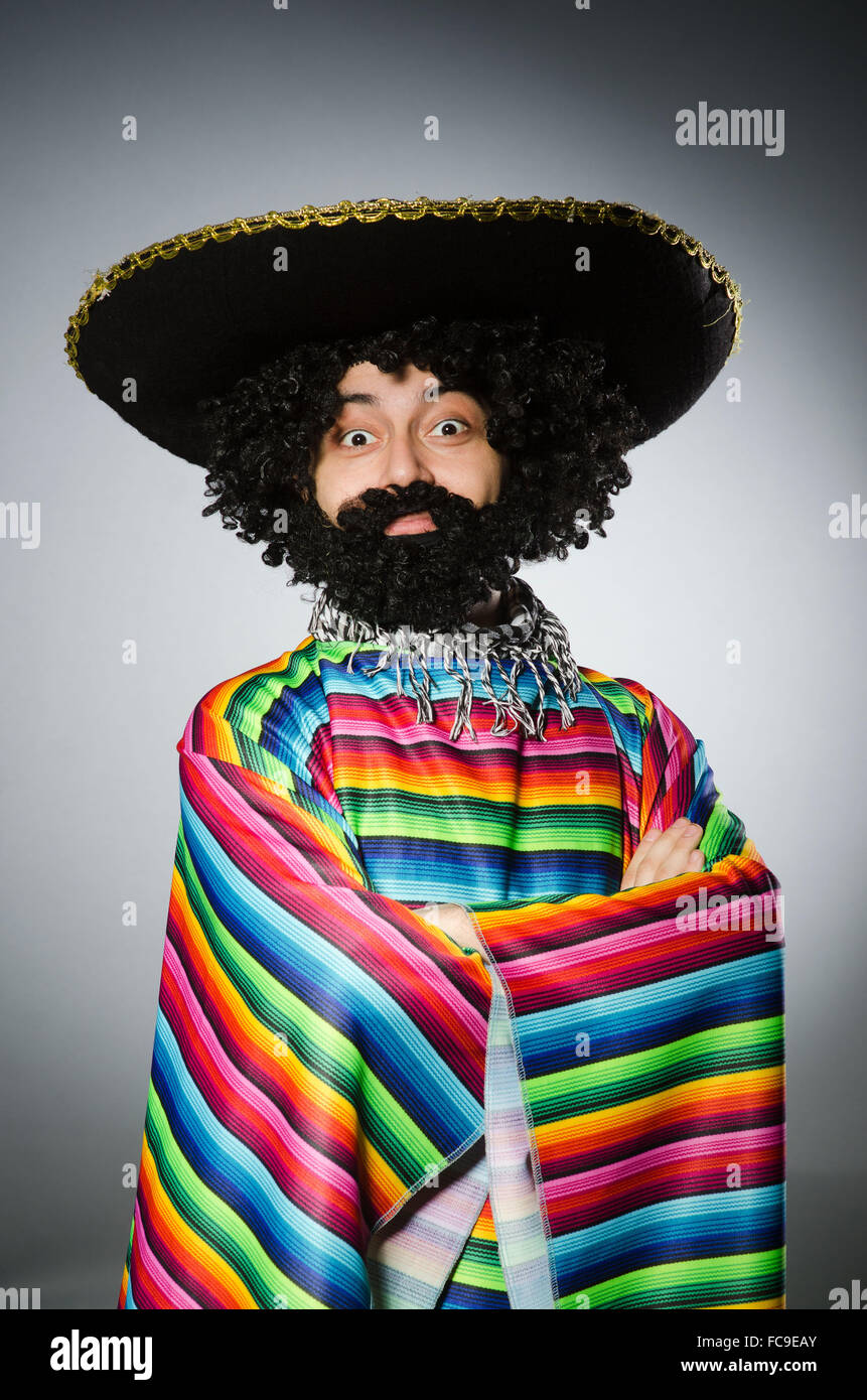 Person wearing sombrero hat in funny concept Stock Photo - Alamy