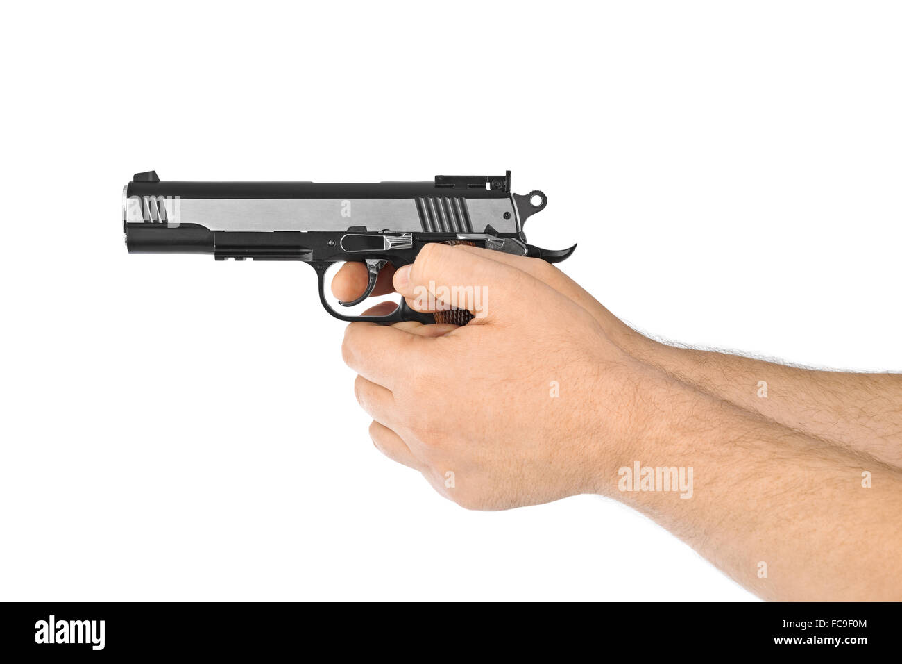 Hand with pistol Stock Photo - Alamy