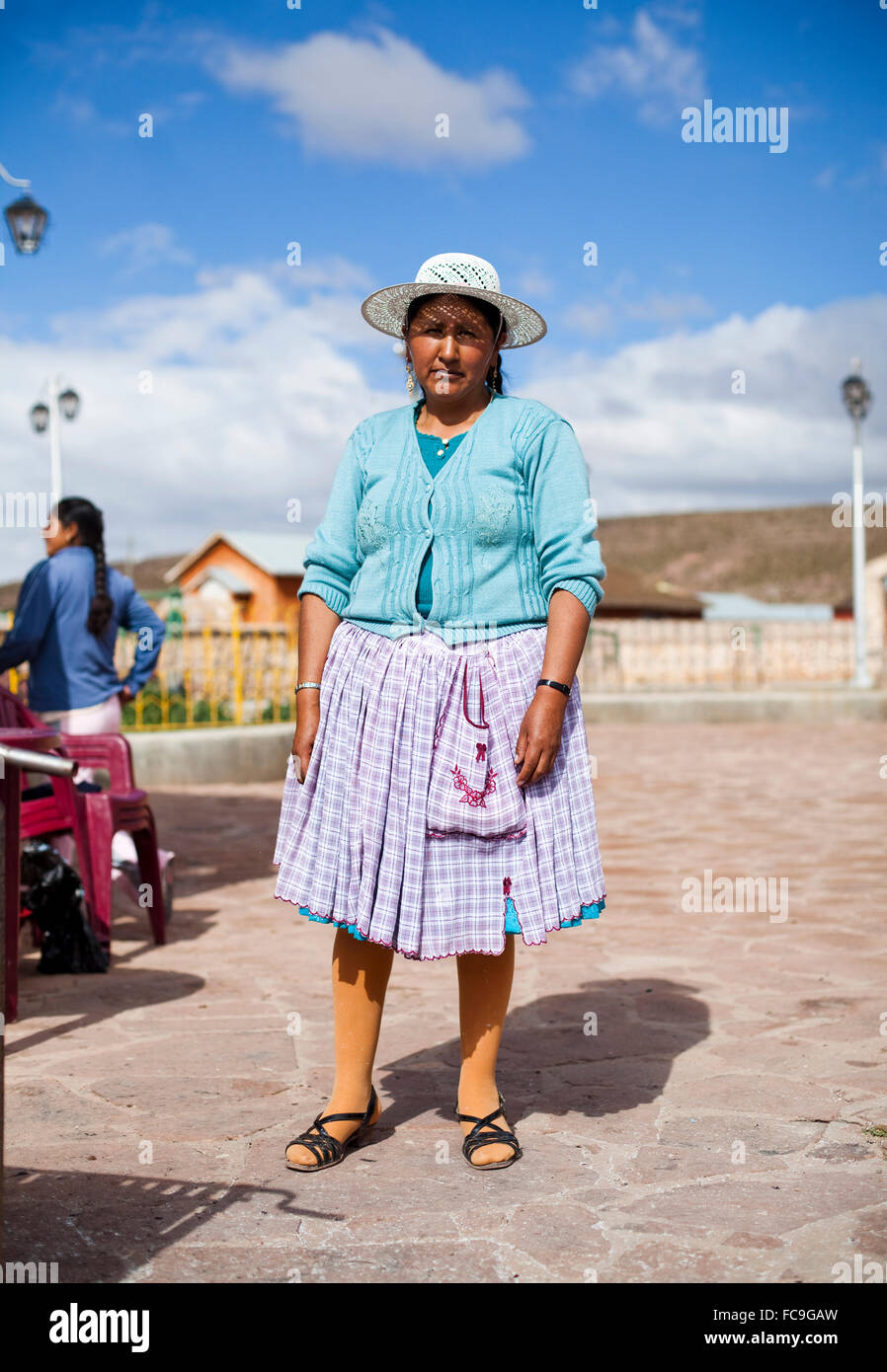 A portrait of a woman in a plaza in rural Bolivia Stock Photo - Alamy
