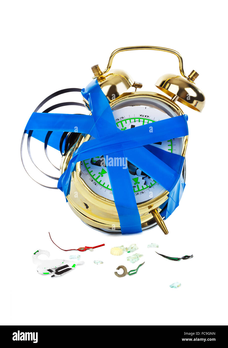 Broken alarm clock with insulating tape Stock Photo - Alamy