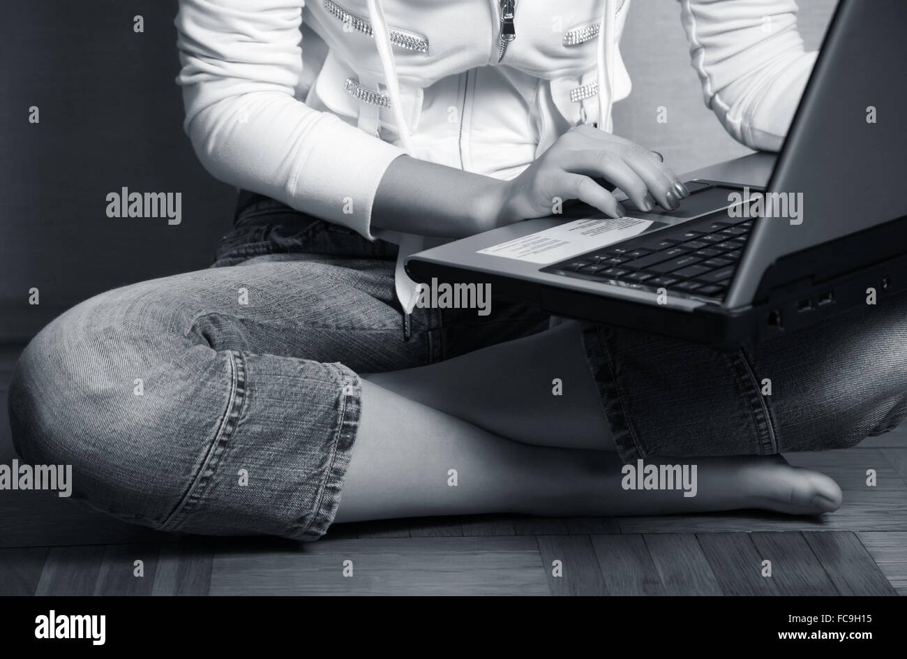 Girl with a computer Stock Photo - Alamy