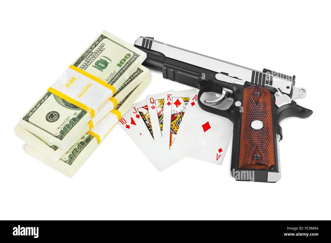 Gun money and playing cards Stock Photo - Alamy