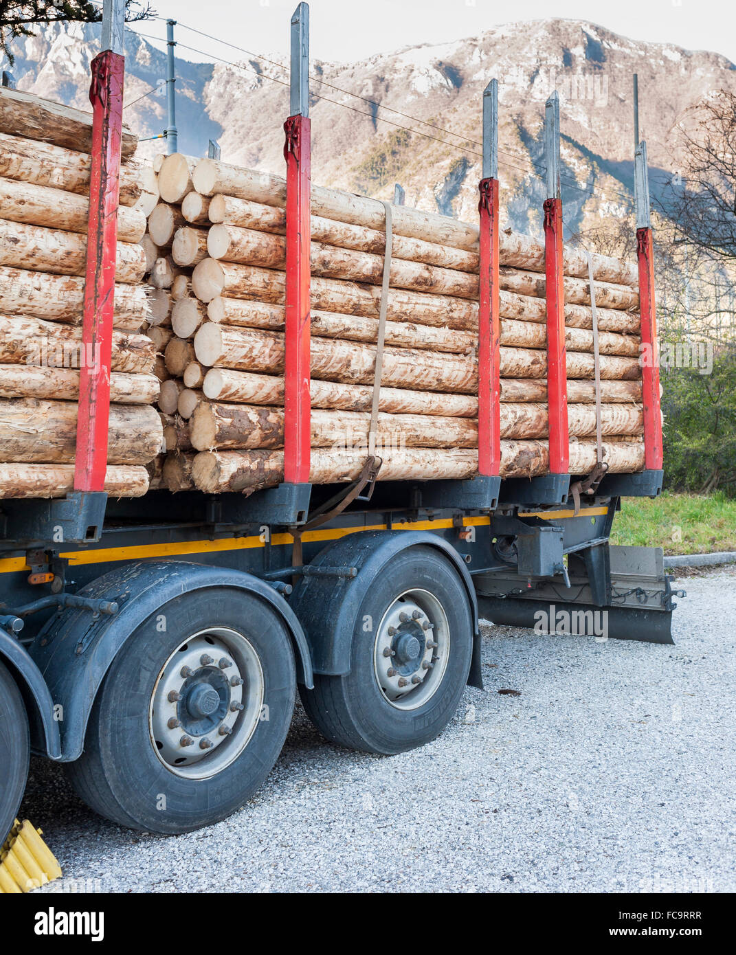 Forest industry. Trailer loaded with tree trunks Stock Photo - Alamy