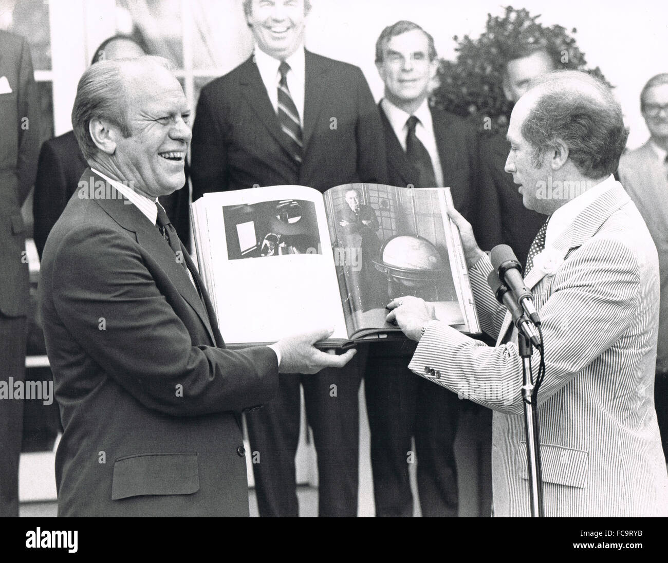 Prime Minister Pierre Elliott Trudeau of Canada, right, presents a ...
