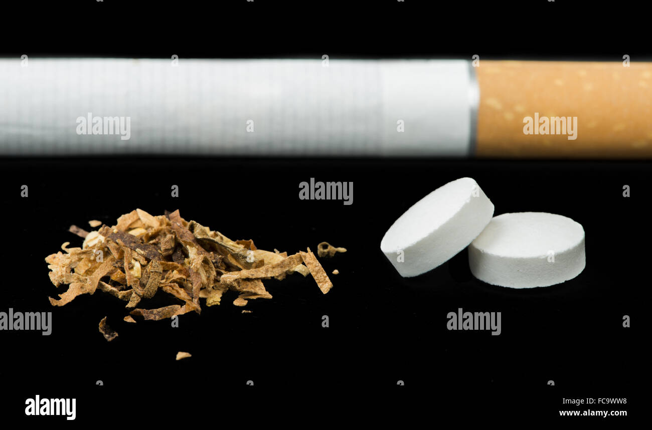 Cigarette, tobacco and pills Stock Photo - Alamy