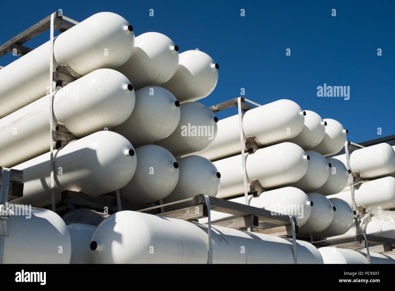 White industrial butan bottles Stock Photo - Alamy