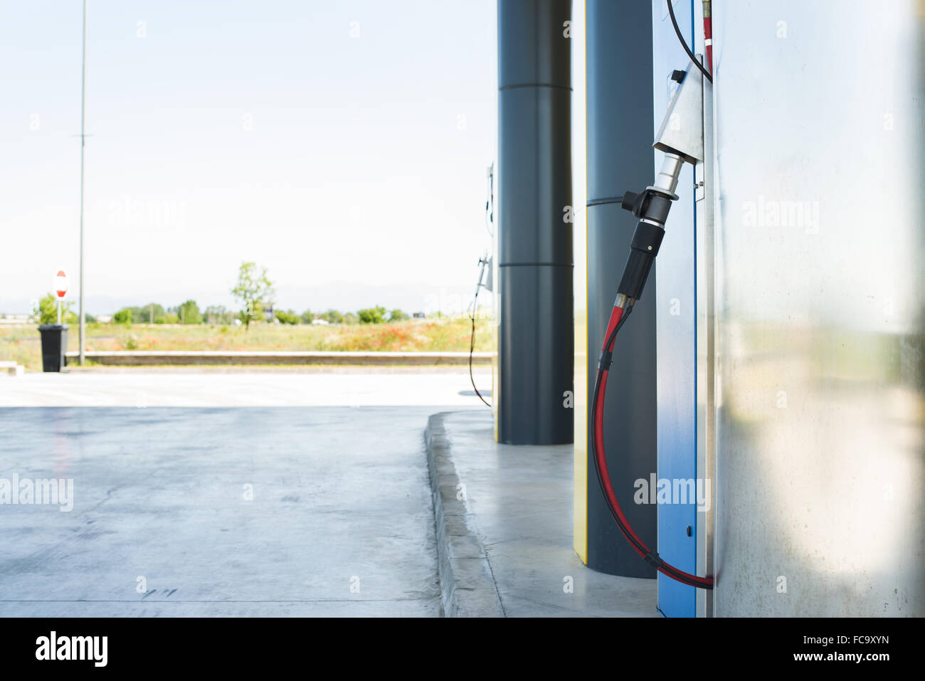Device for charging gas car on station Stock Photo - Alamy