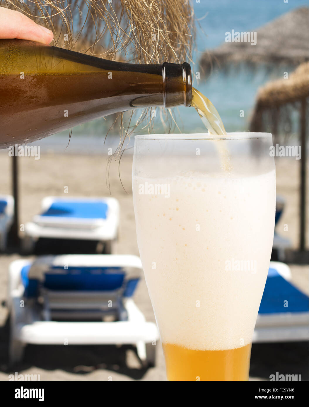 Beer and beach background Stock Photo - Alamy