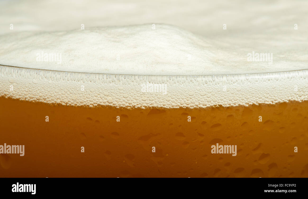 Mug beer close up background Stock Photo - Alamy