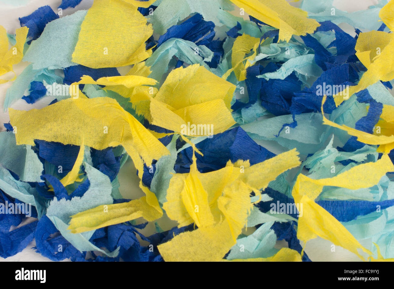 Many colorful pieces of torn paper Stock Photo - Alamy