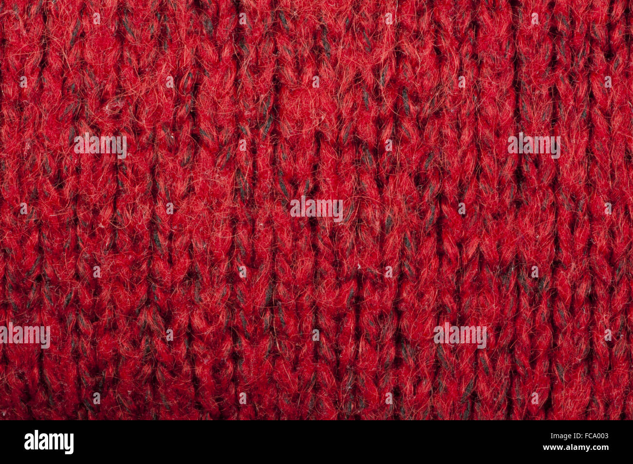 Handmade knit red background Stock Photo - Alamy