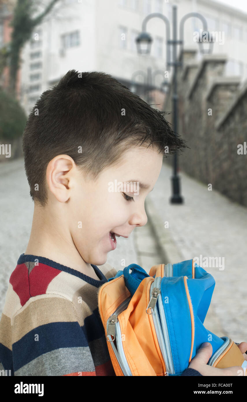 Boy with schoolbag Stock Photo - Alamy