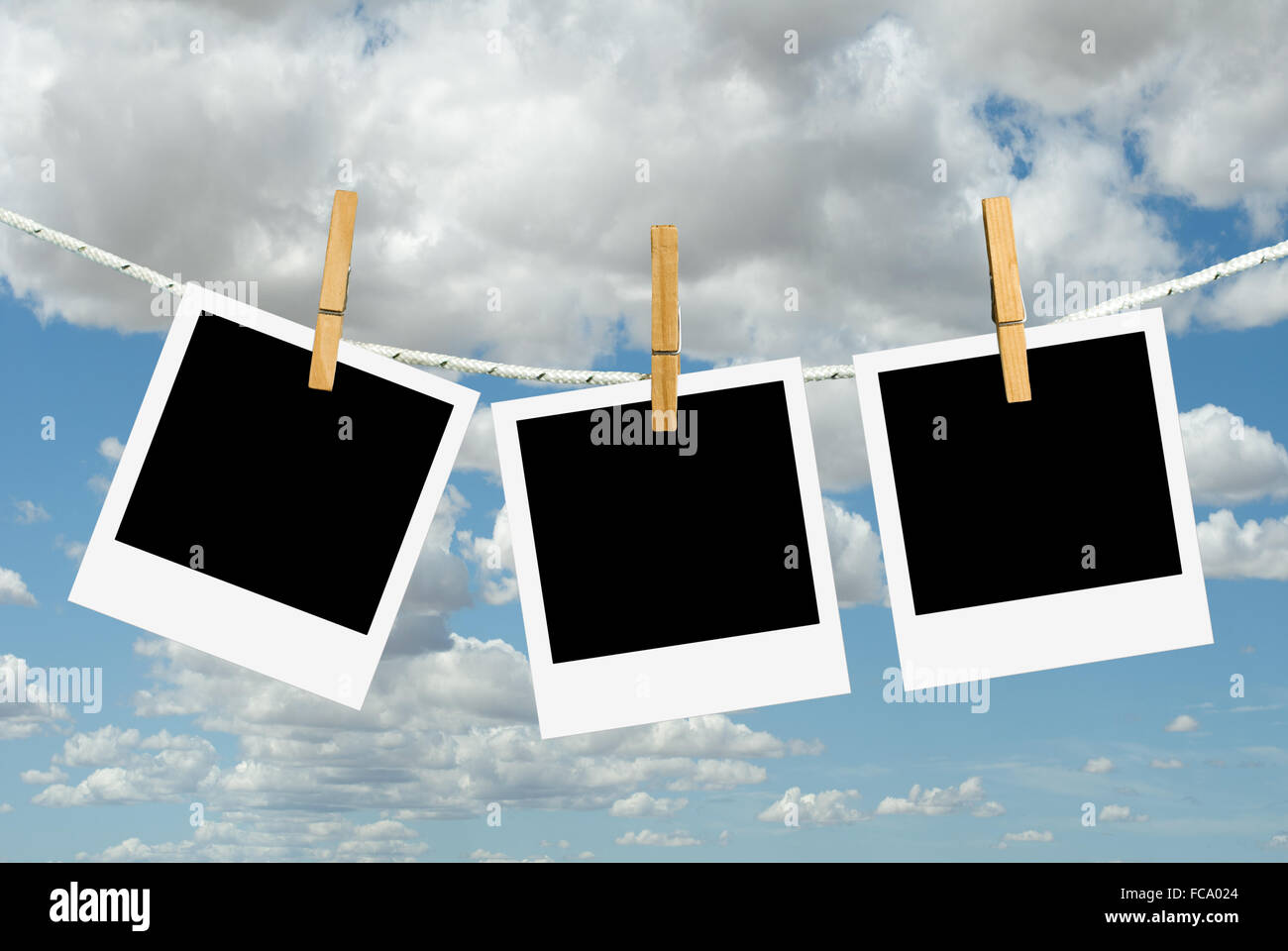 Pictures hooked on a rope Stock Photo - Alamy