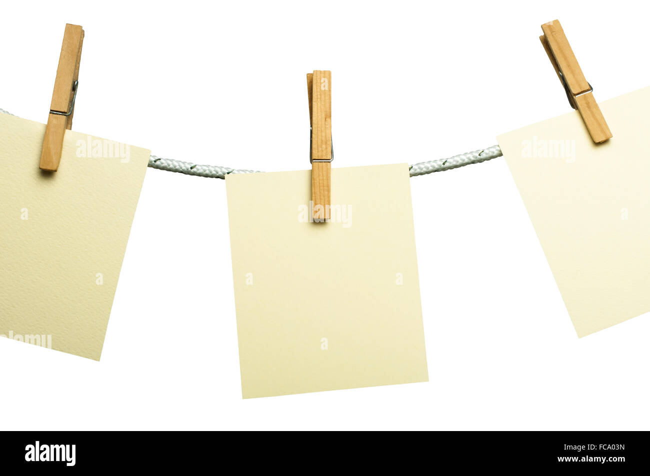 Note papers hooked on a rope Stock Photo - Alamy