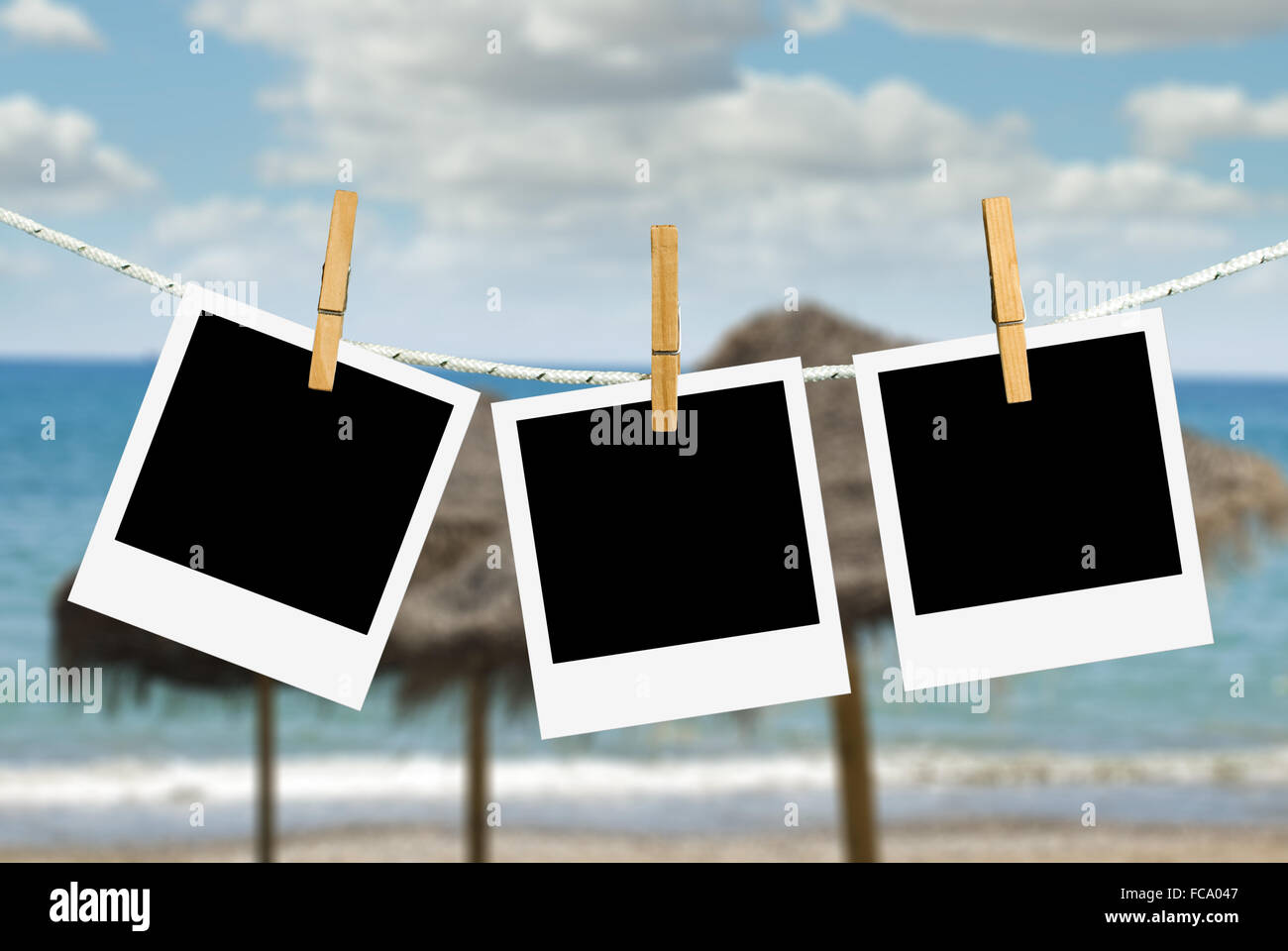 Pictures hooked on a rope Stock Photo - Alamy