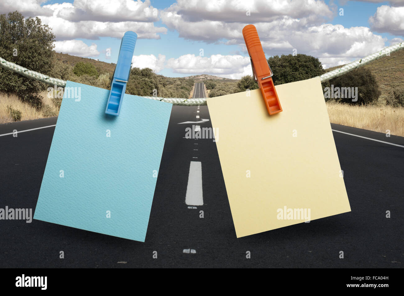 Note papers hooked on a rope Stock Photo - Alamy