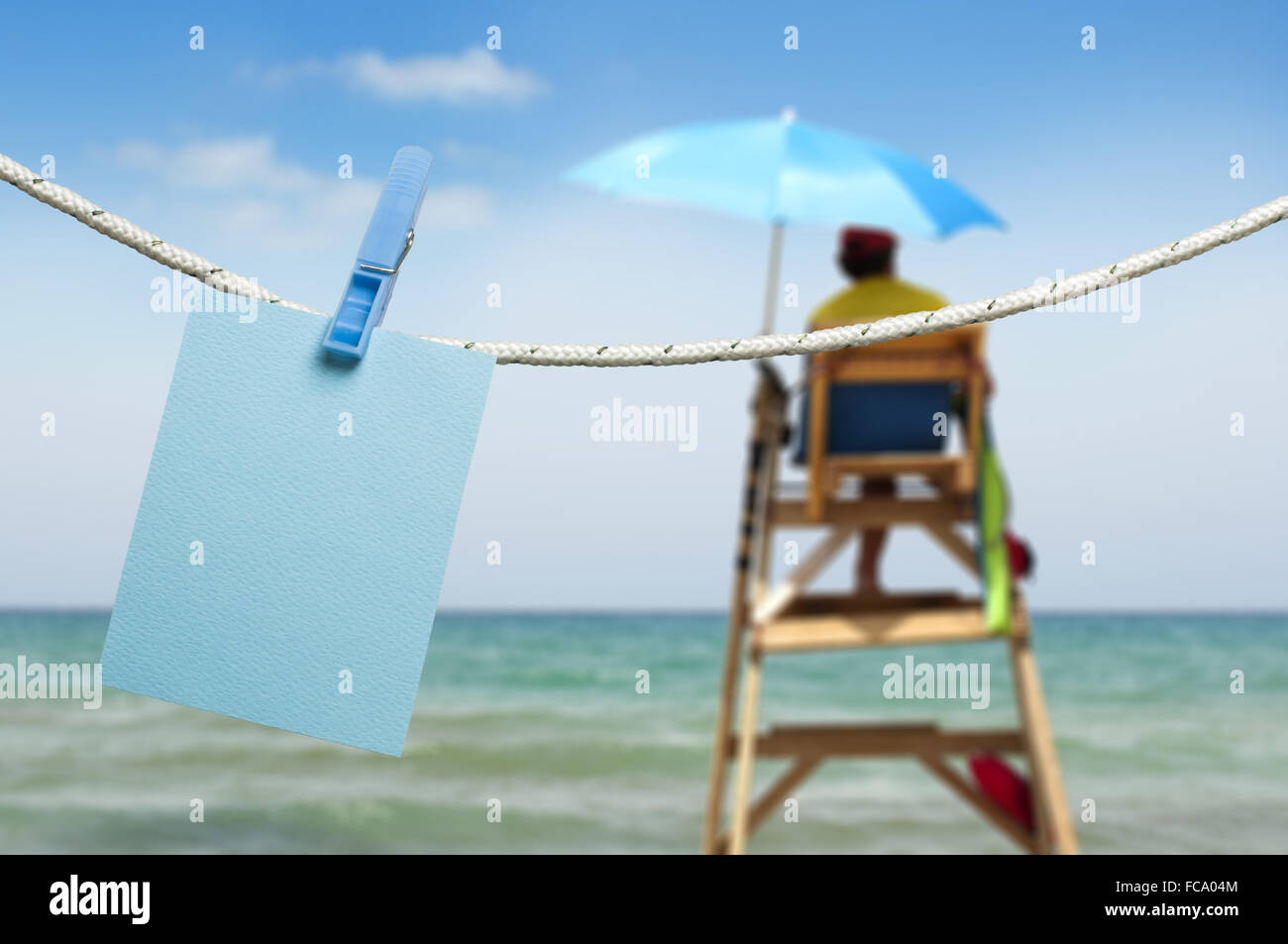 Note papers hooked on a rope Stock Photo - Alamy