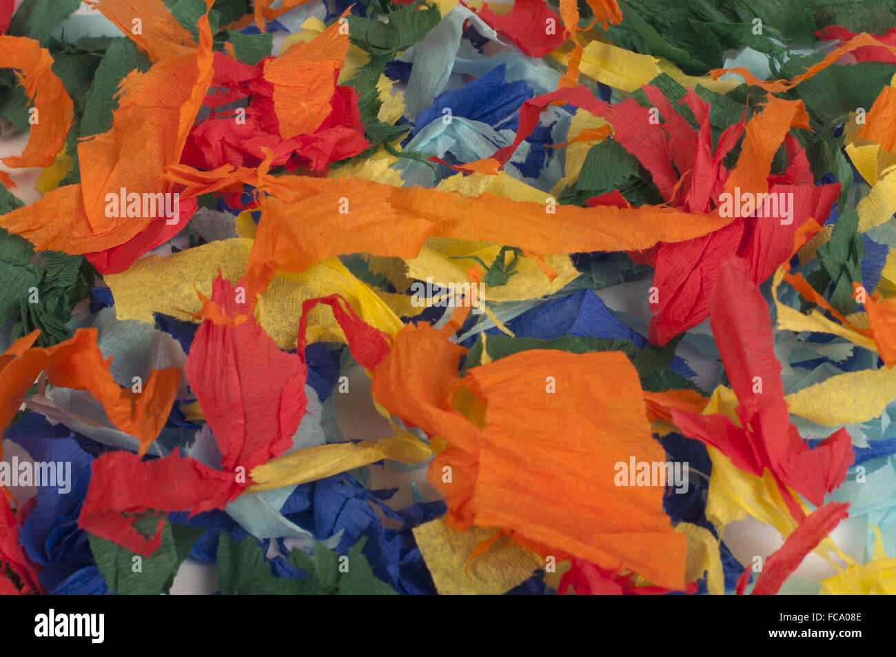 Many colorful pieces of torn paper Stock Photo - Alamy