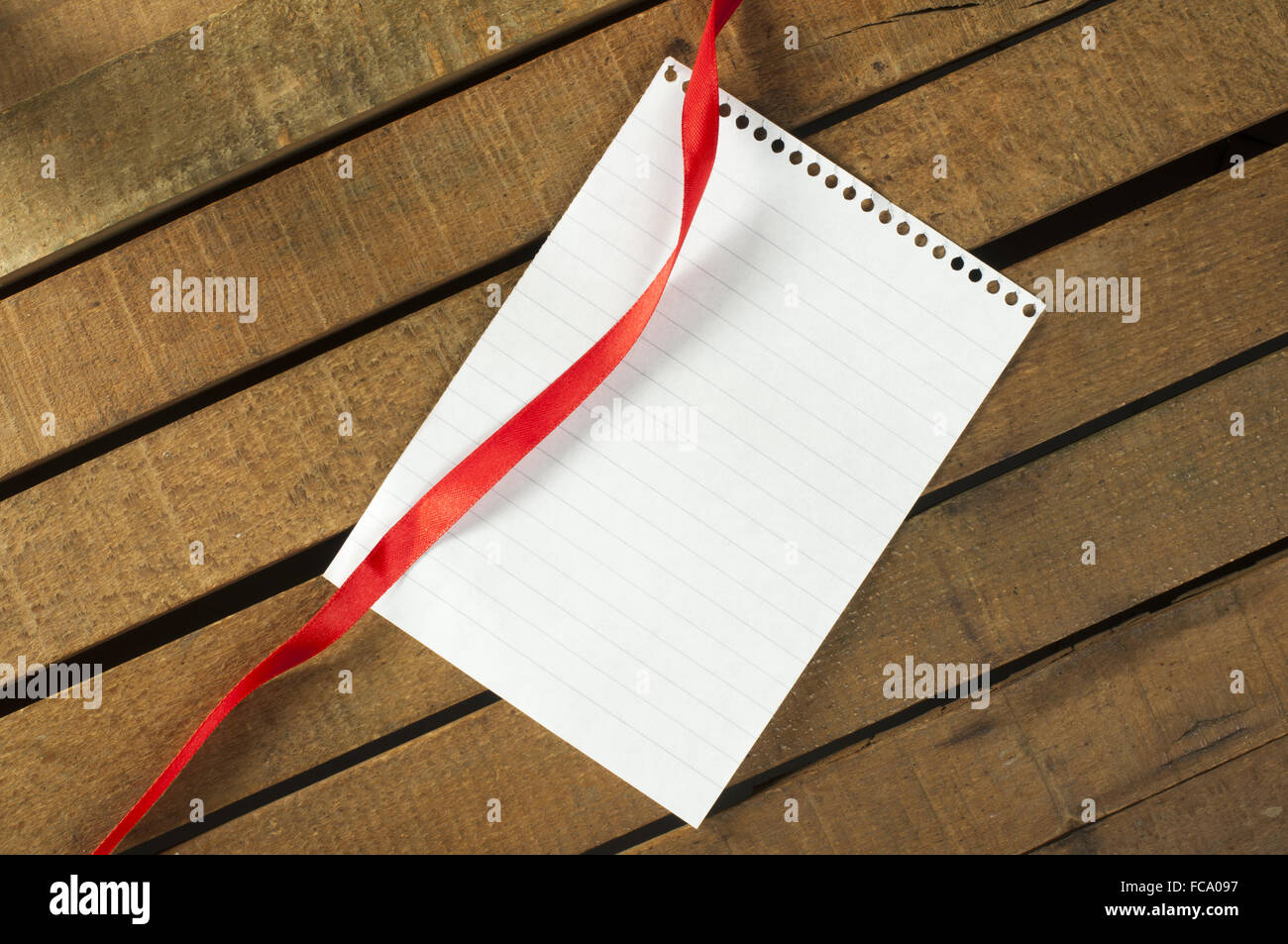 Ribbon and white paper sheet Stock Photo - Alamy