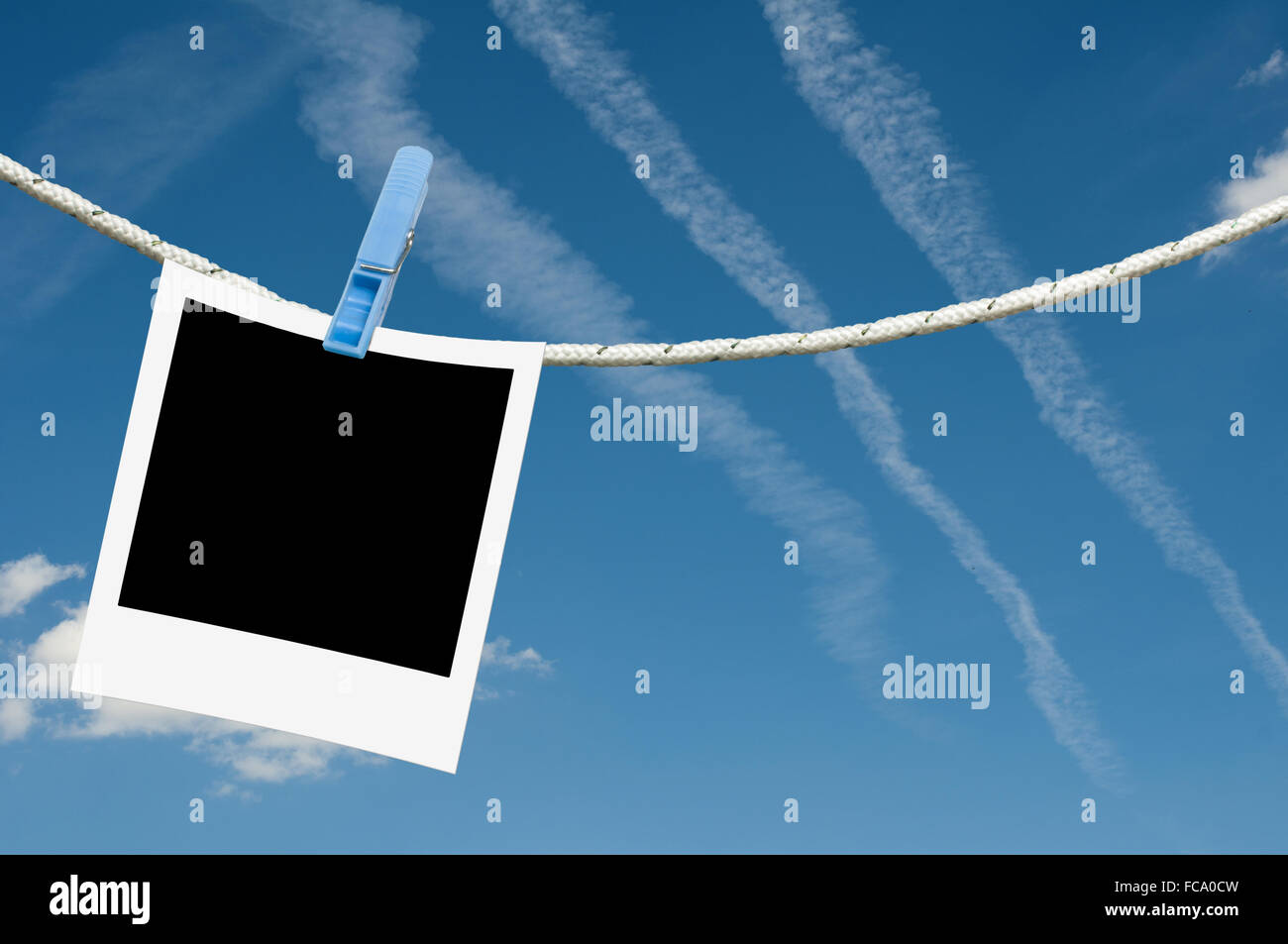 Picture template hooked on a rope Stock Photo - Alamy