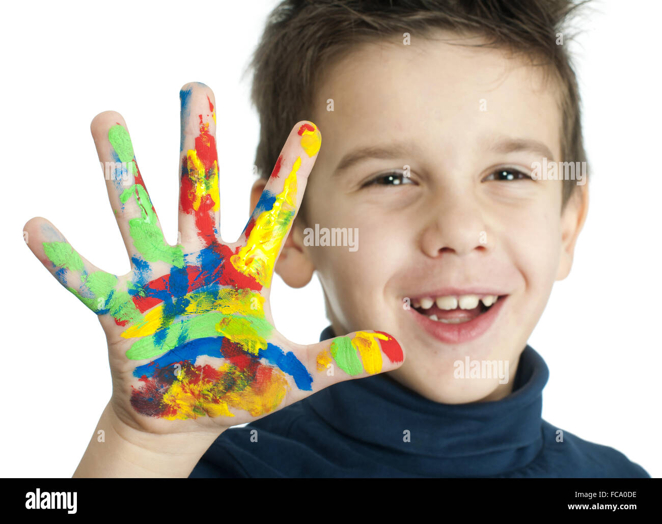 Boy hands painted with colorful paint Stock Photo - Alamy