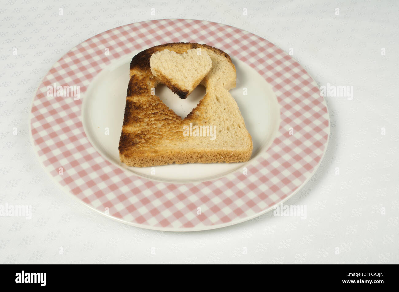 Toast with heart-shaped Stock Photo - Alamy