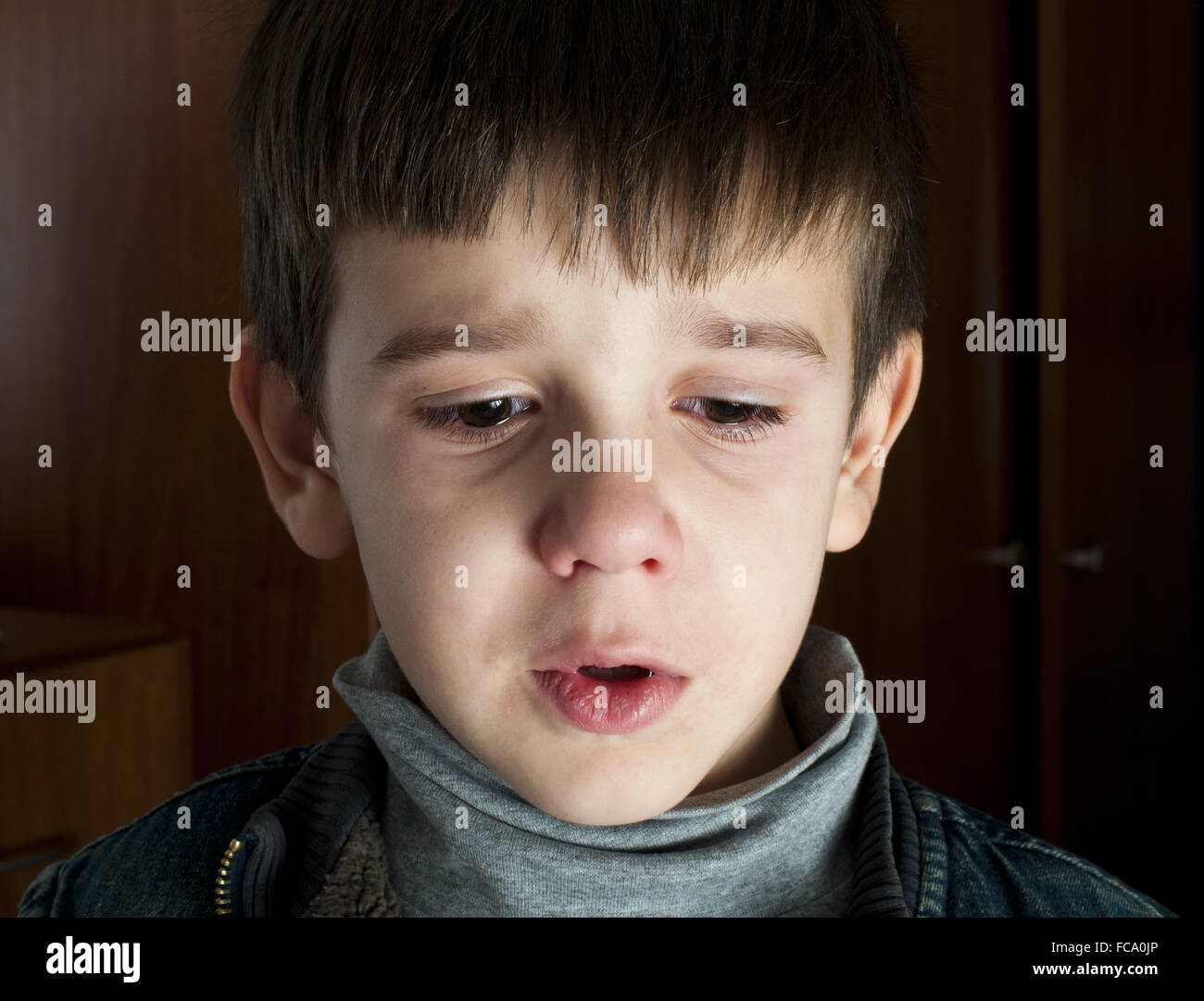 Face of crying child Stock Photo - Alamy