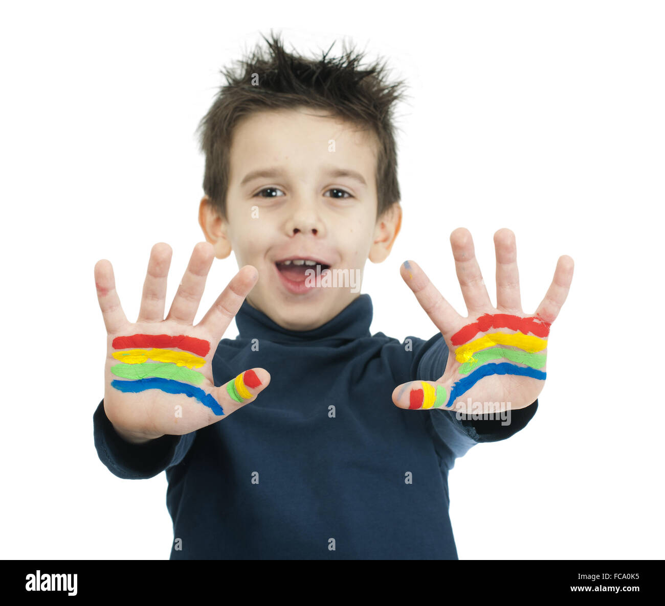 Boy hands painted with colorful paint Stock Photo - Alamy