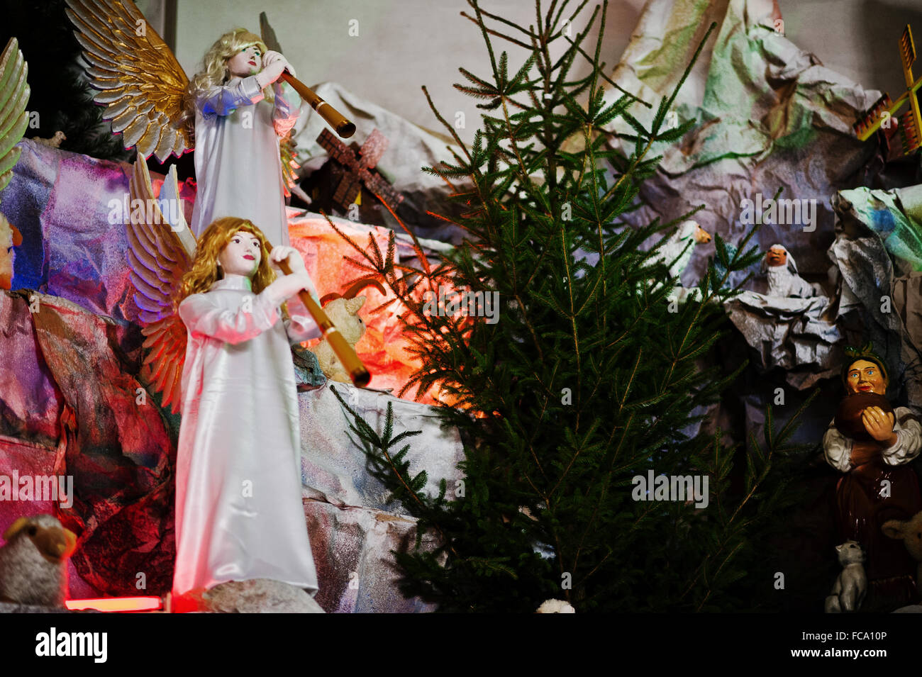 Very large christmas nativity crib. Trumpeting angels Stock Photo - Alamy