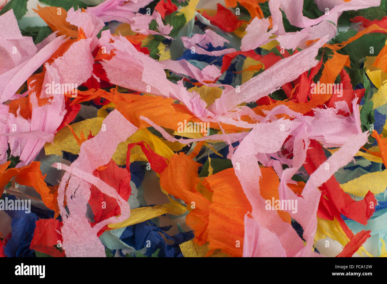 Many colorful pieces of torn paper Stock Photo - Alamy