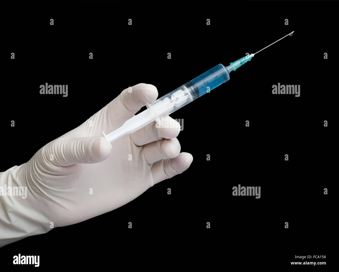 Hand hold medical syringe Stock Photo - Alamy
