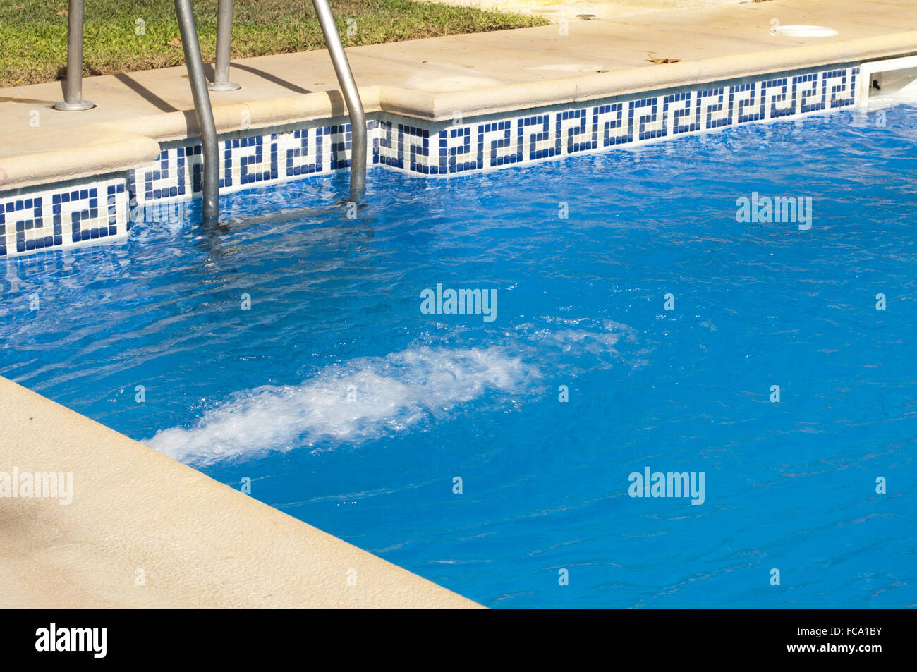 Swimming pool and pillar Stock Photo - Alamy