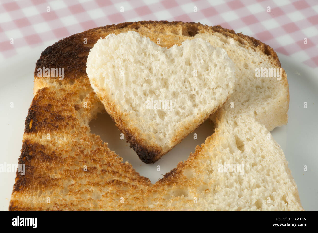 Toast with heart-shaped Stock Photo - Alamy