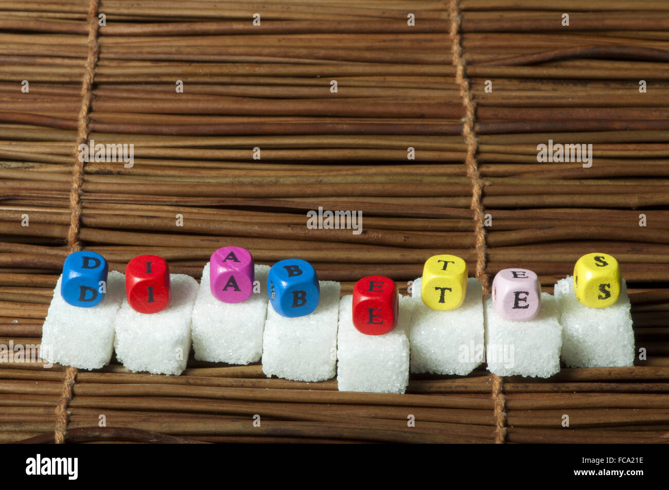 Sugar lumps and word diabetes Stock Photo - Alamy