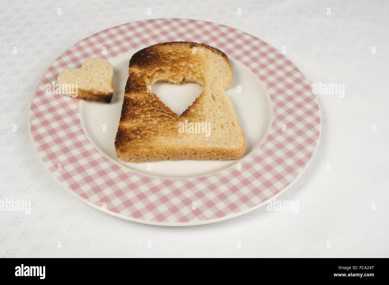 Toast with heart-shaped Stock Photo - Alamy