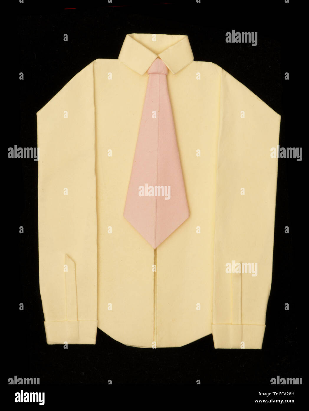 Isolated paper made shirt with long sleeves Stock Photo - Alamy