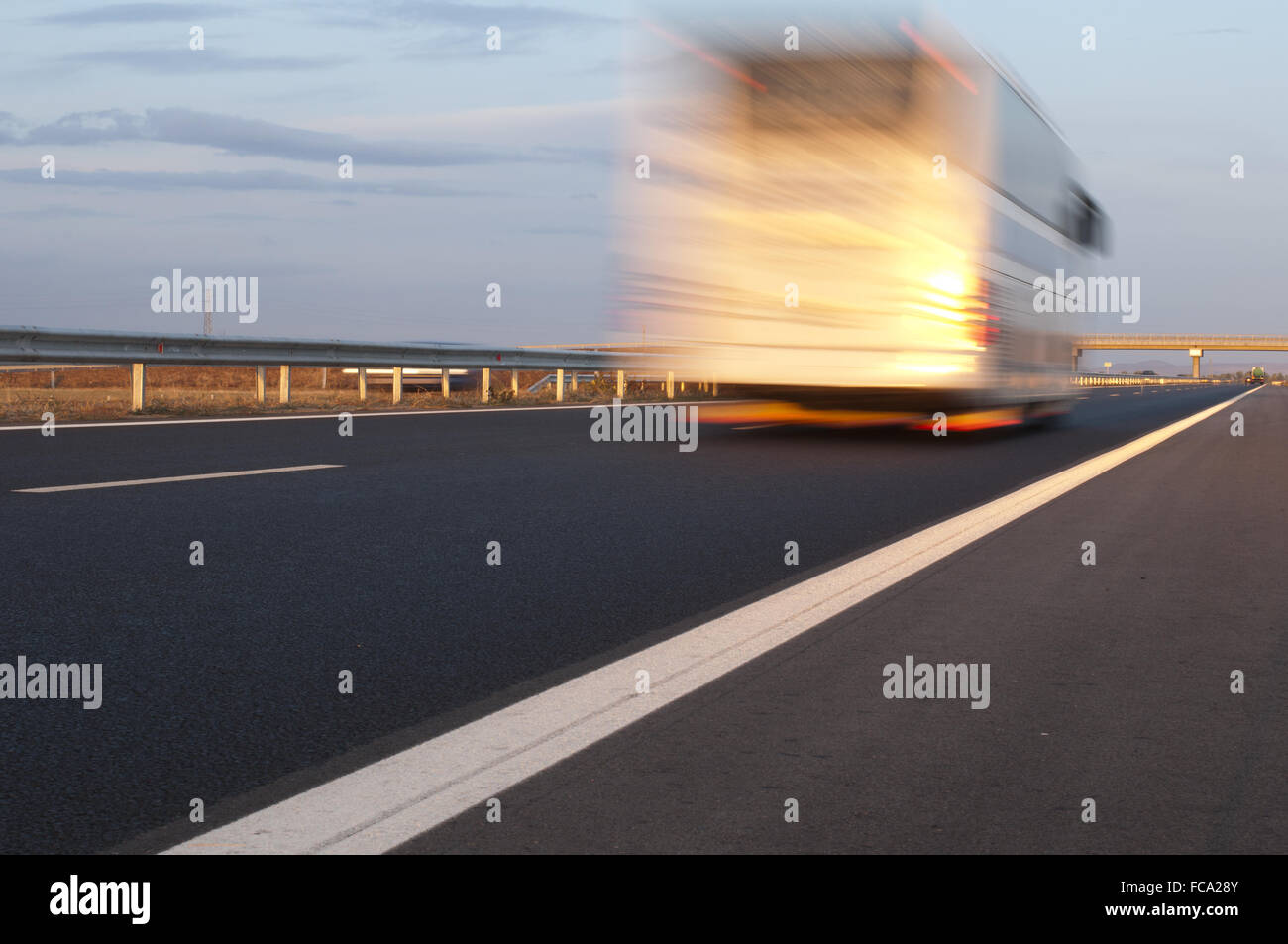 Bus traveling on highway. Motion blur effect Stock Photo - Alamy