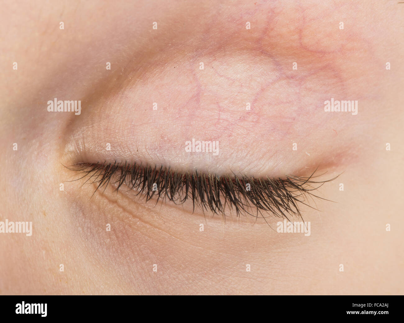 Human eye closed Stock Photo - Alamy