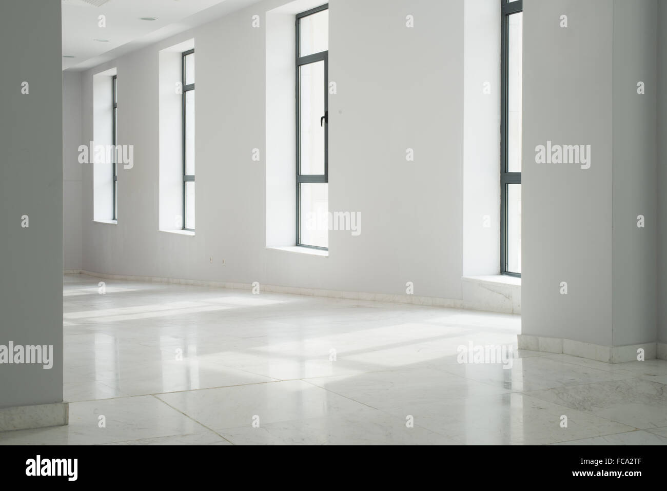 Interior of a building with white walls Stock Photo - Alamy