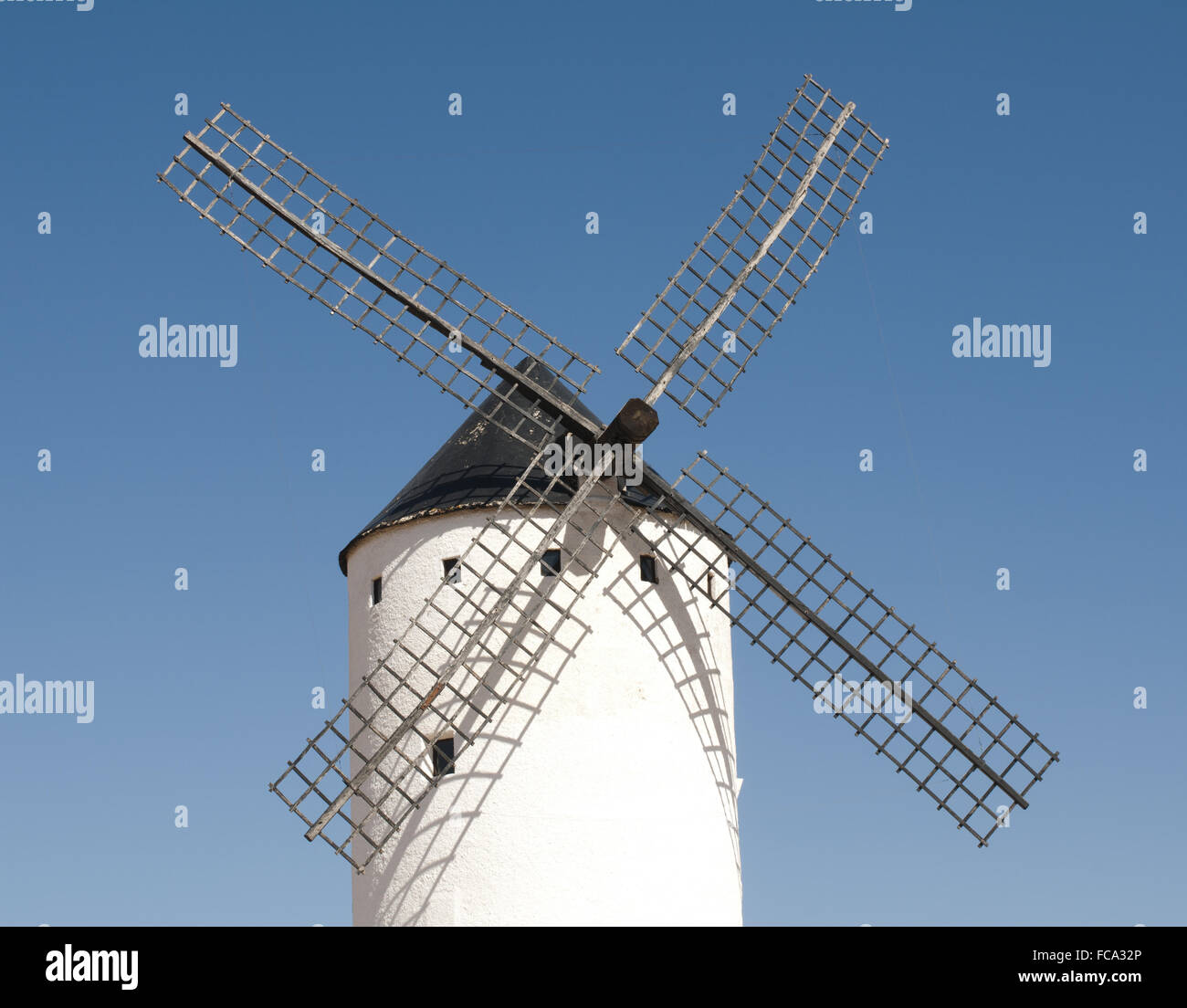 White ancient windmill Stock Photo - Alamy