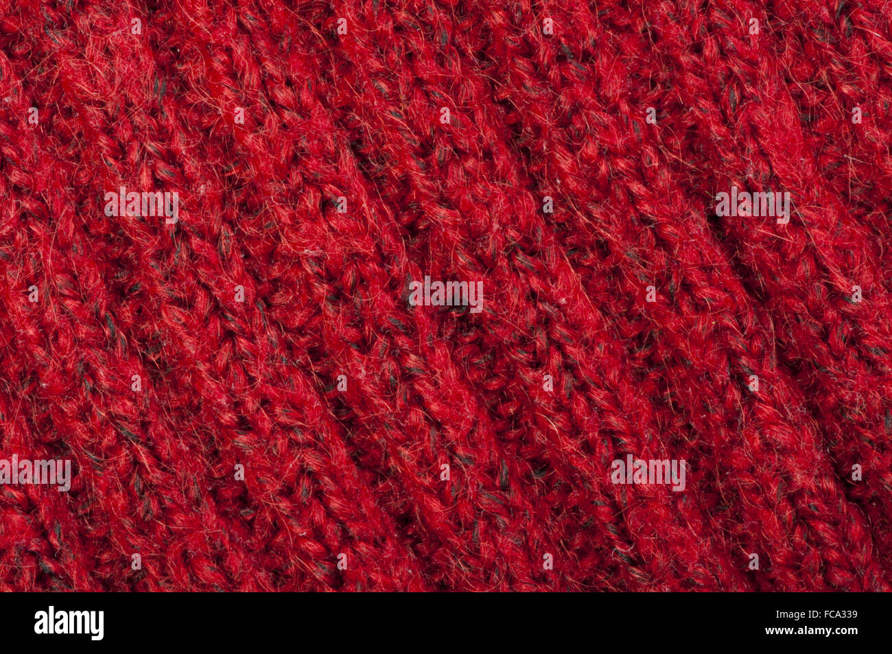 Handmade knit red background Stock Photo - Alamy