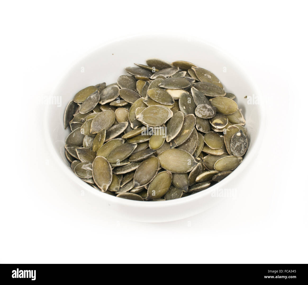 Roasted pumpkin shelled seeds Stock Photo - Alamy